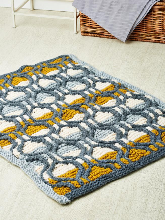 Super Chunky Cable Rug | Knitting Patterns | Let's Knit Magazine